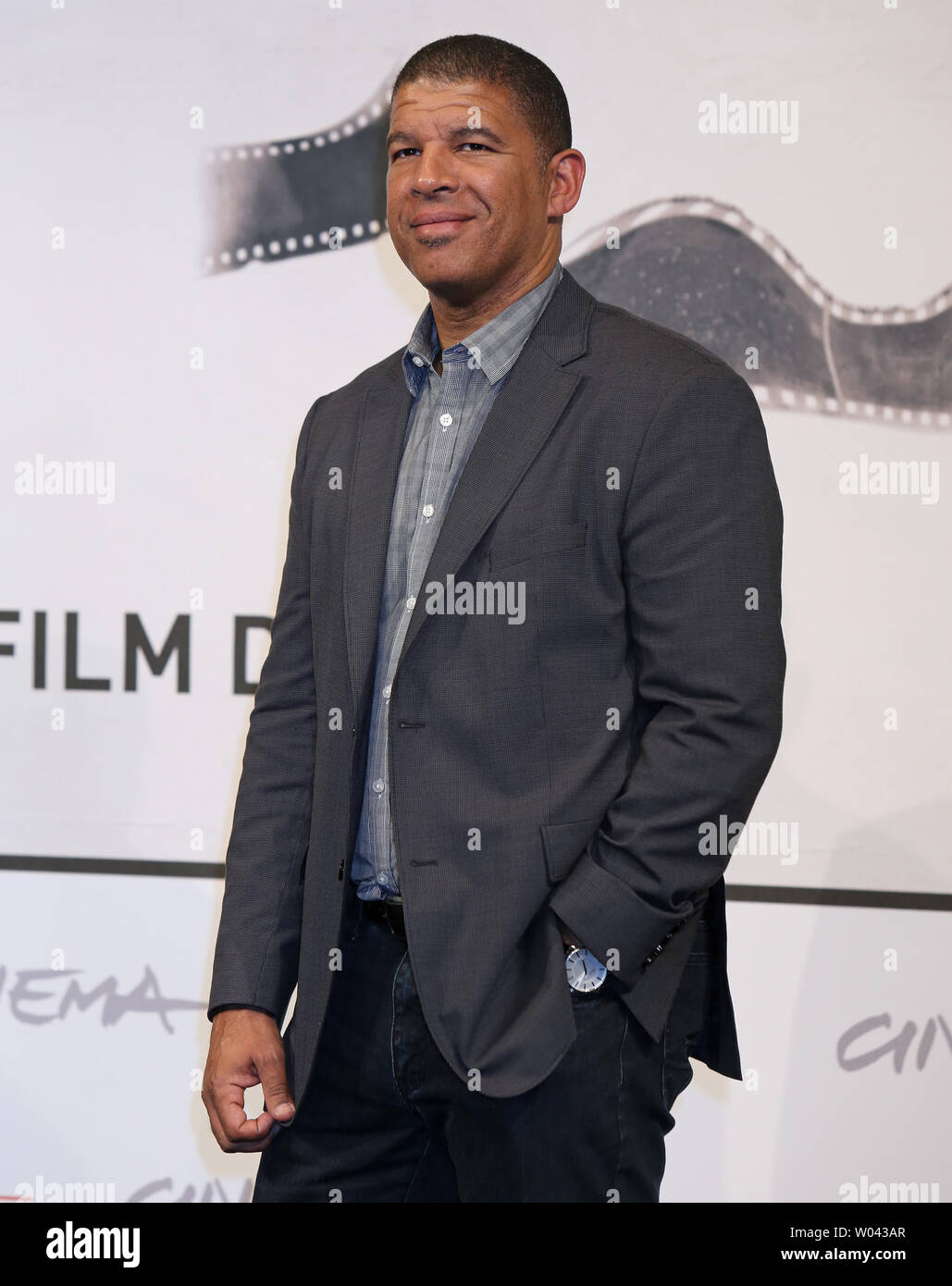 Peter Ramsey arrives at a photo call for the film "Rise of the ...