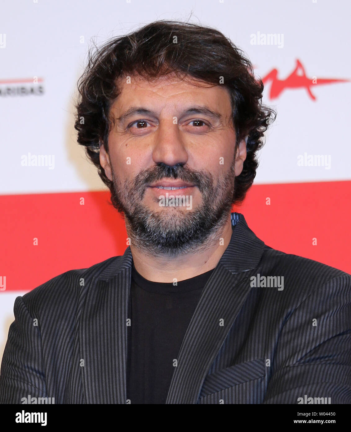 Walter Leonardi arrives at a photo call for the film "La luna su Torino ...