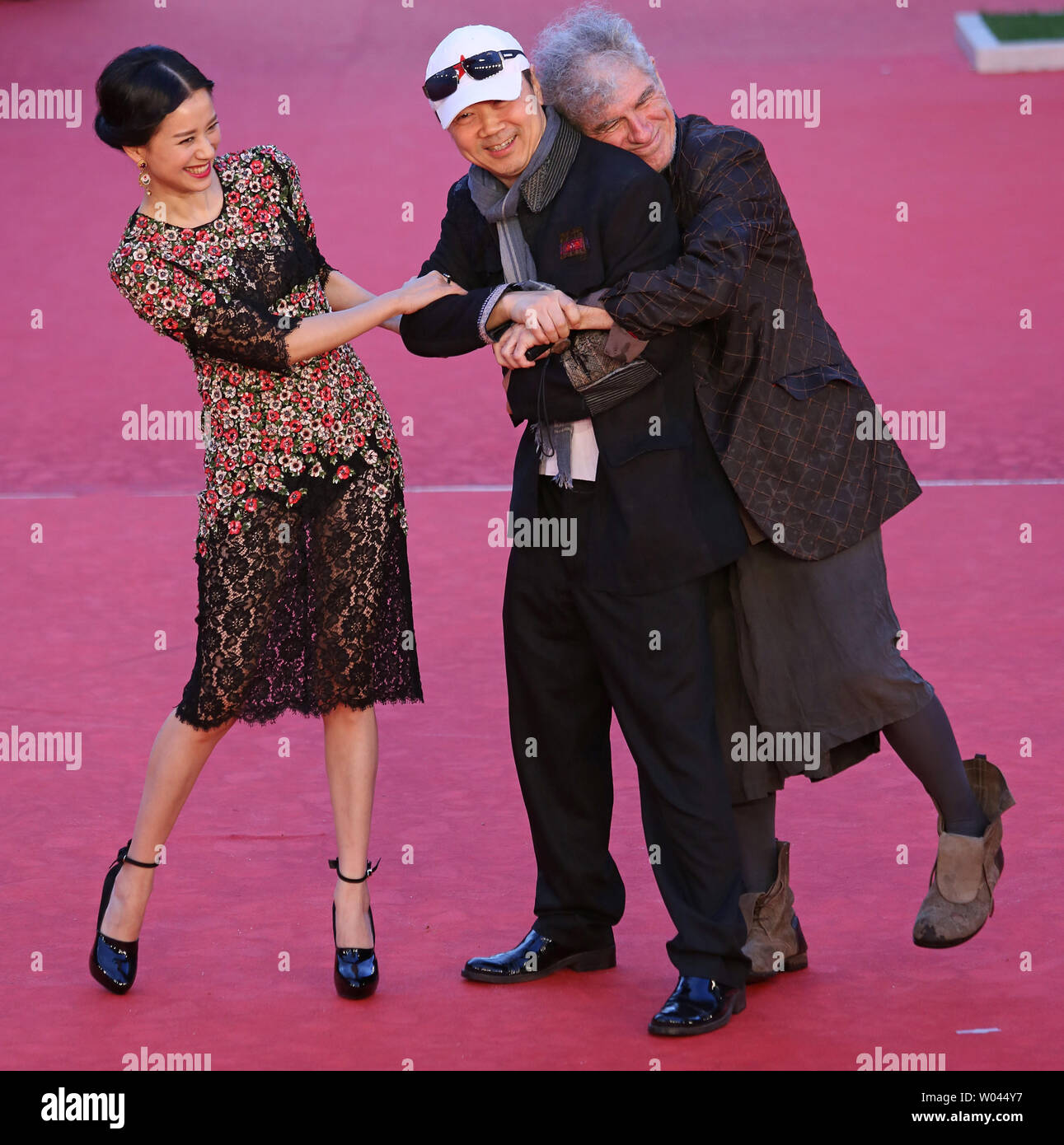 Ni Hongjie (L), Cui Jian (C) and Christopher Doyle arrive on the red ...