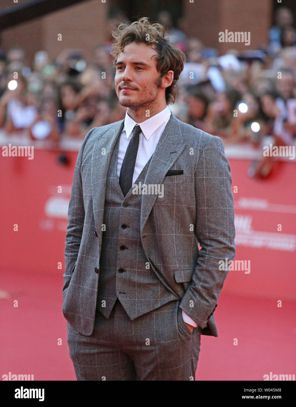 Sam Claflin arrives on the red carpet before the screening of the film ...