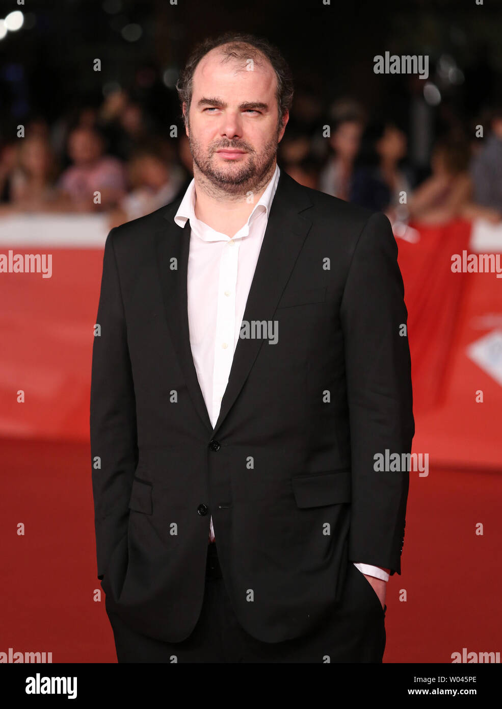 Cedric Anger arrives on the red carpet before the screening of the film ...