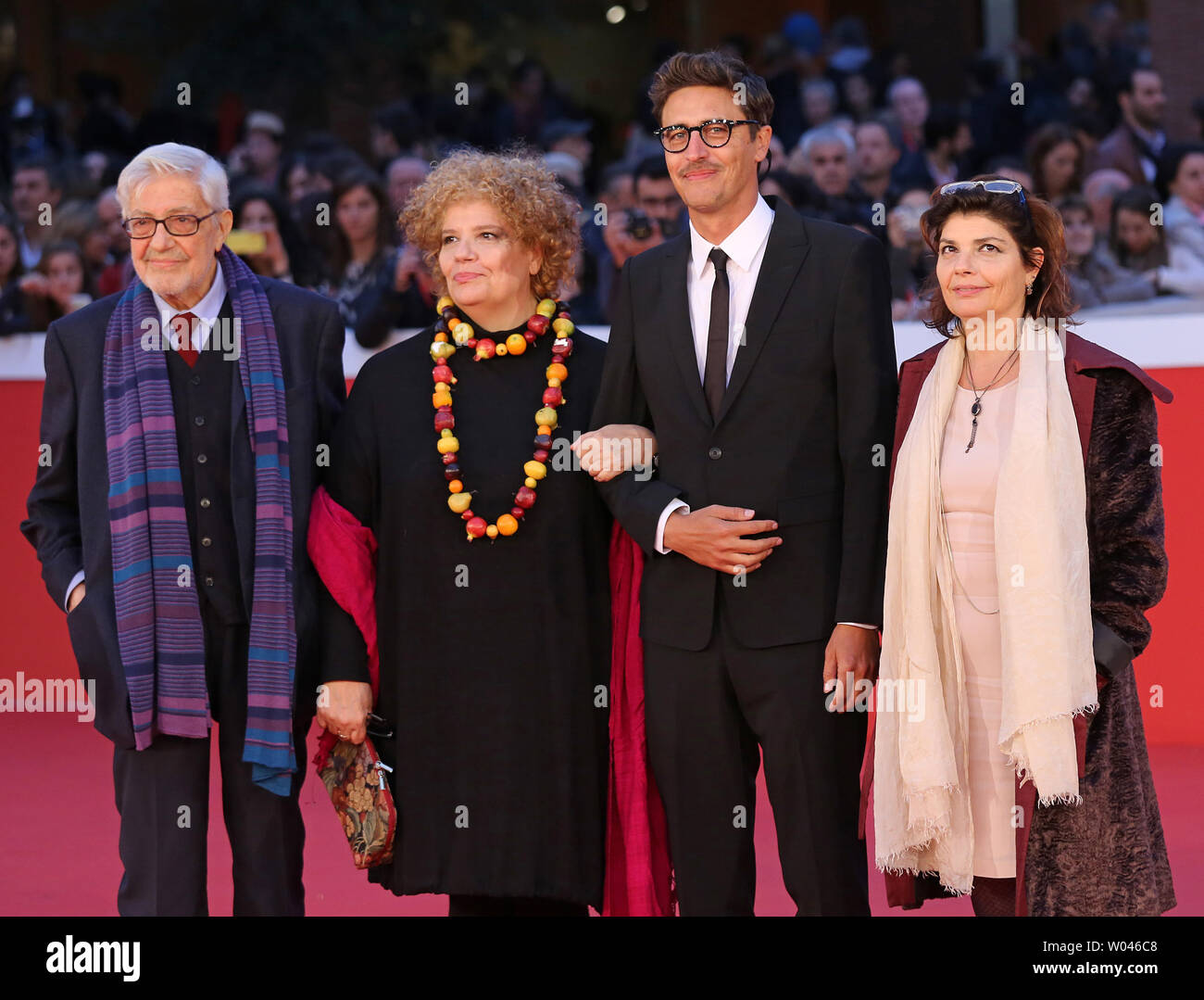(From L to R) Ettore Scola, Paola Scola, Pierfrancesco Diliberto and ...
