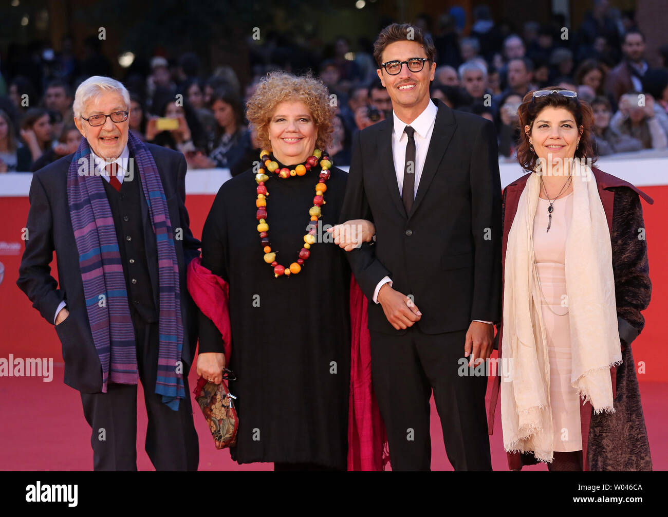 (From L to R) Ettore Scola, Paola Scola, Pierfrancesco Diliberto and ...