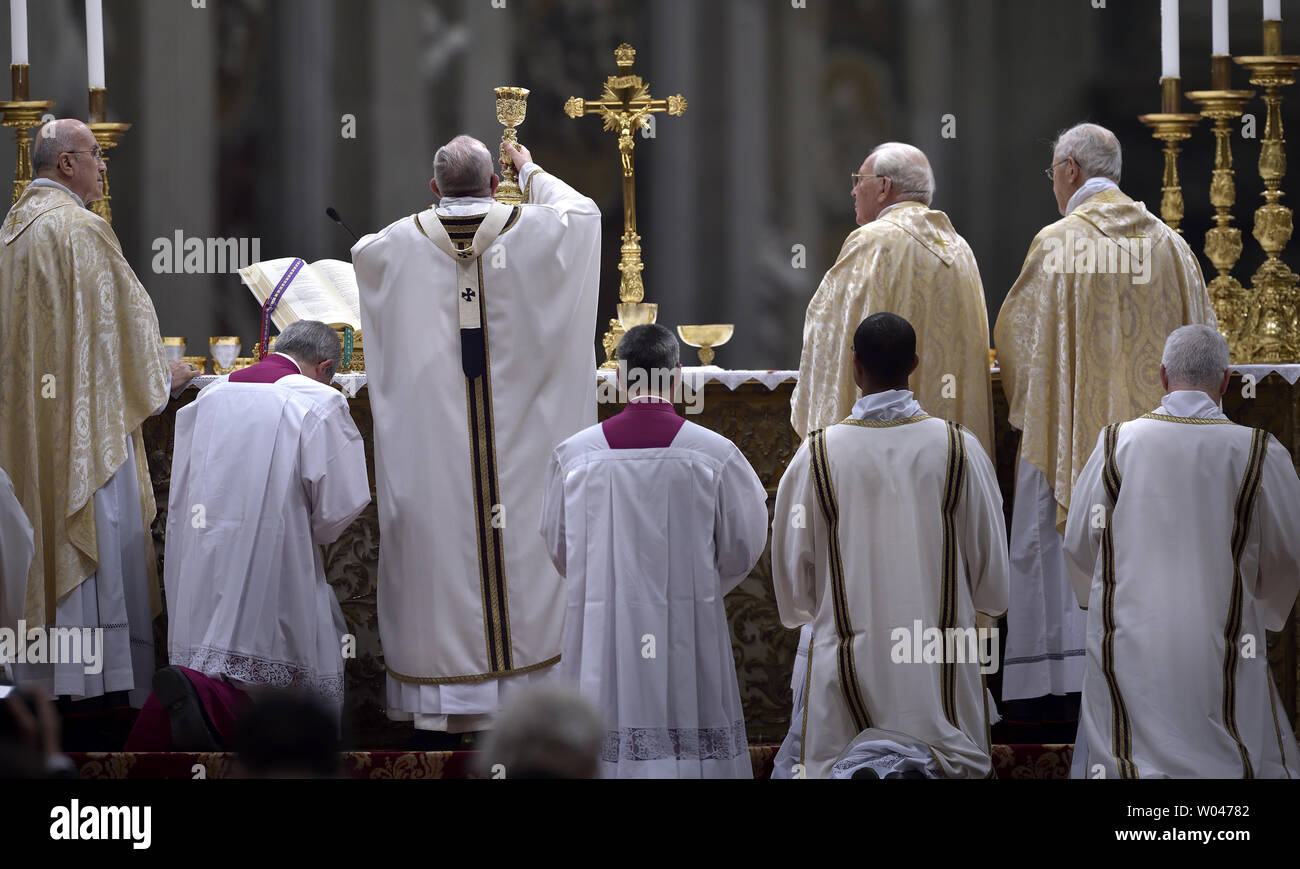Pope Francis serves Christmas Eve Mass at midnight on December 24, 2017 ...