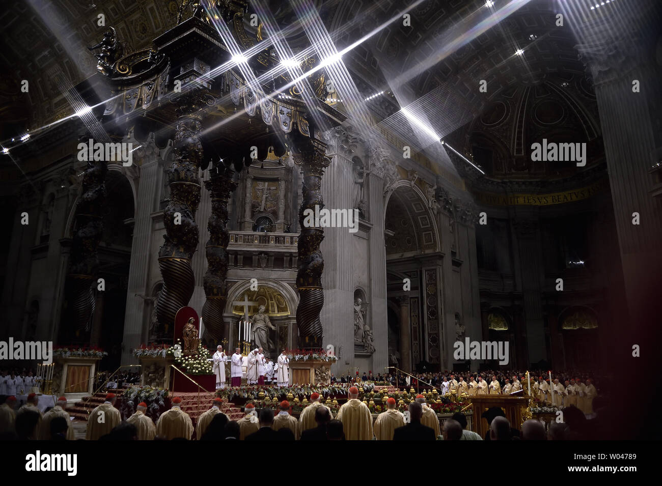 Pope Francis serves Christmas Eve Mass at midnight on December 24, 2017 ...