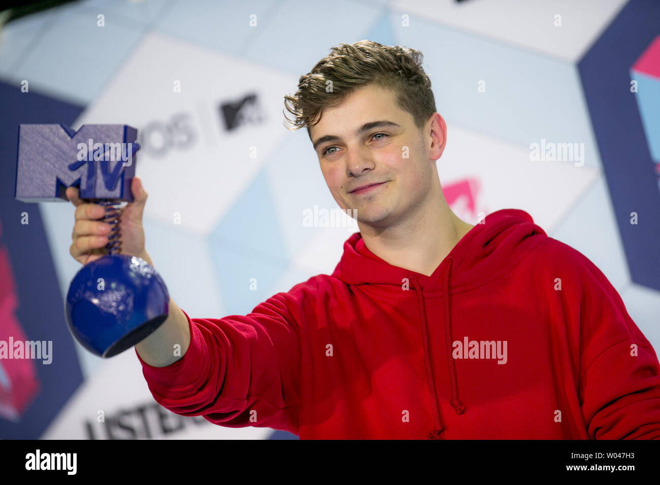 Martin Garrix arrives in the photo room during the MTV Europe Music ...