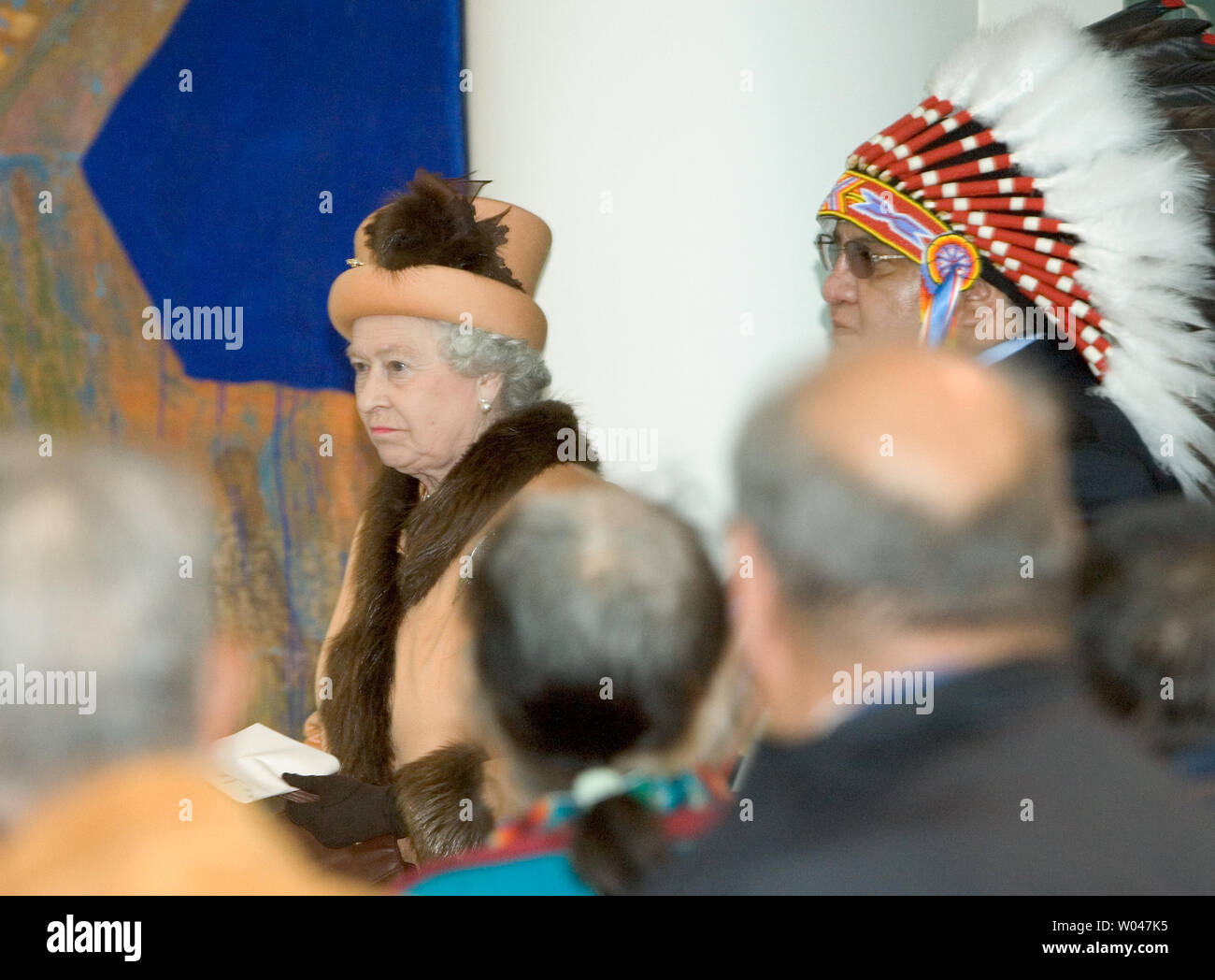 Queen Elizabeth of Great Britain, accompanied by Chief Alphonse Bird of ...