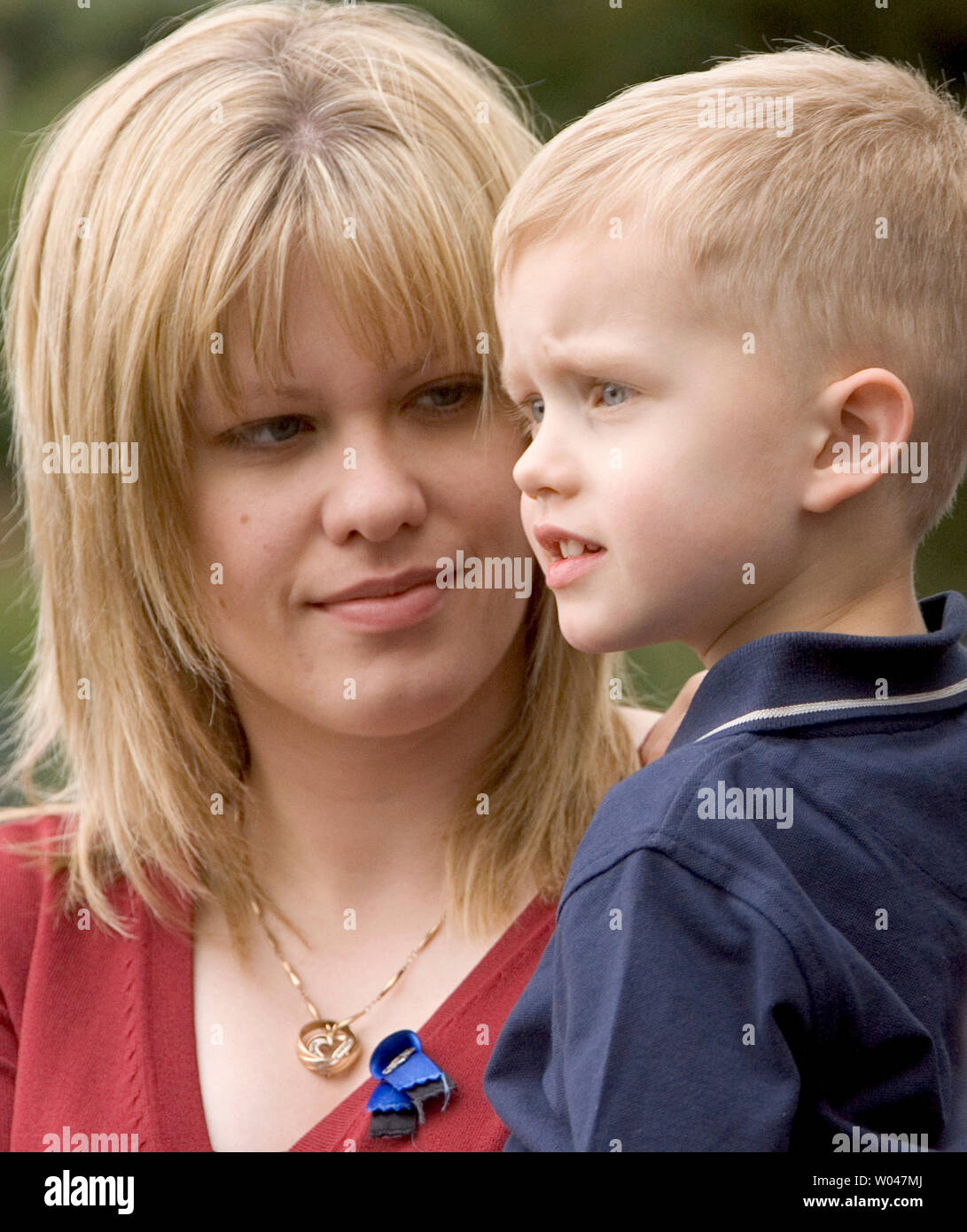 Slain Cst. Anthony Gordon's pregnant wife with their son, waits for the ...