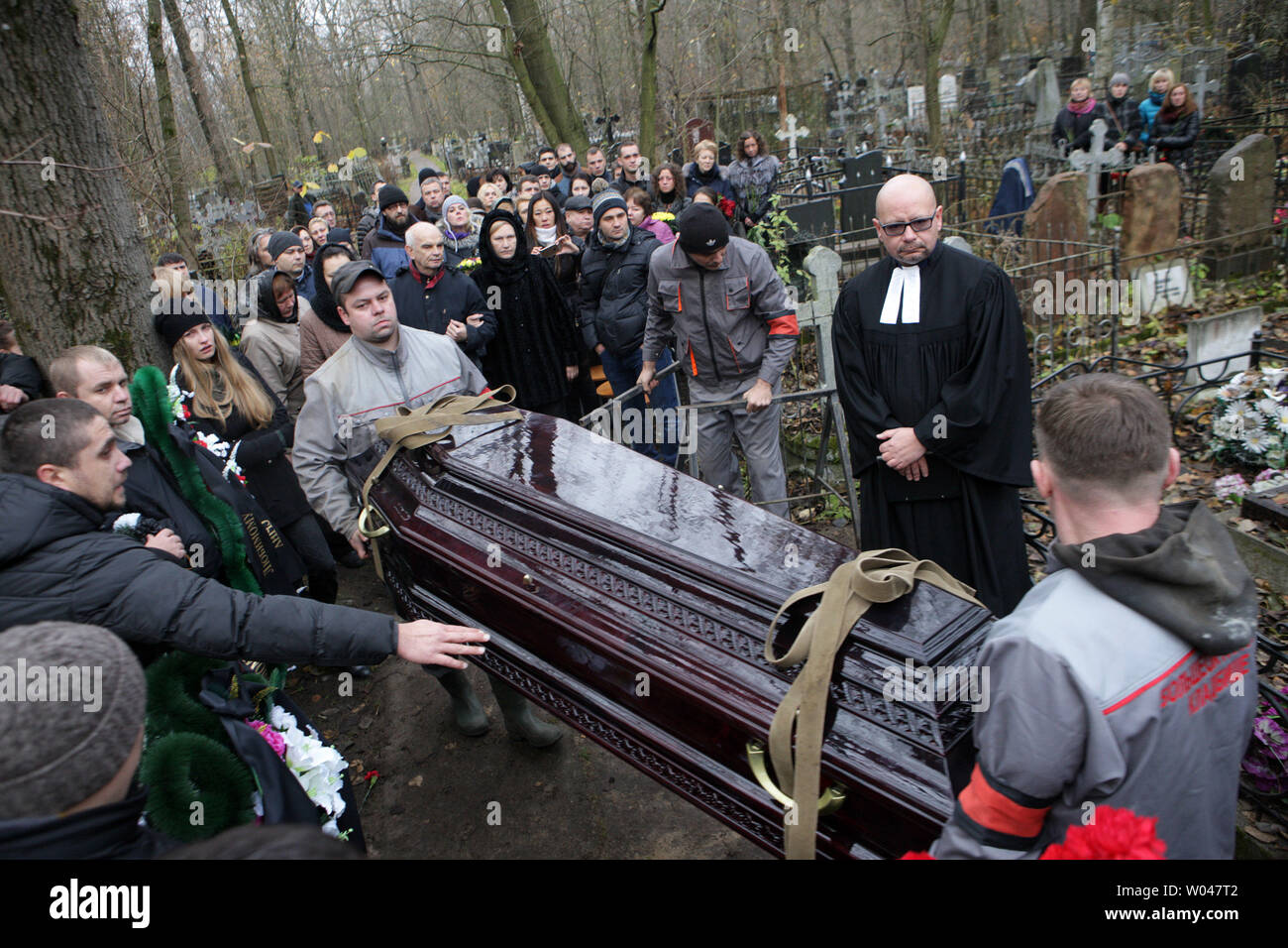 The casket containing the remains of Timur Miller, a resident of ...