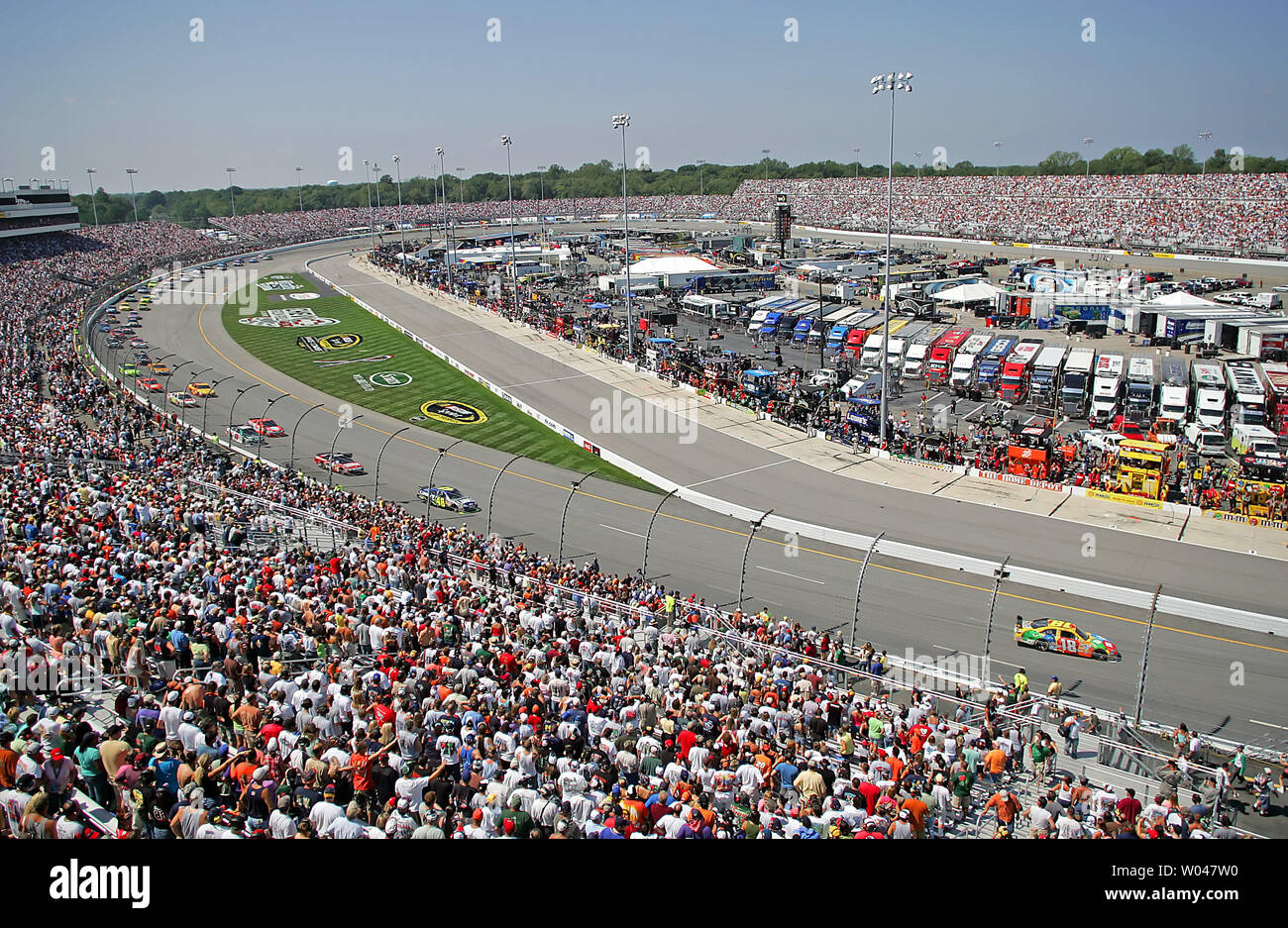 Kyle Busch leads the field at the start of the NASCAR Chevy Rock & Role ...