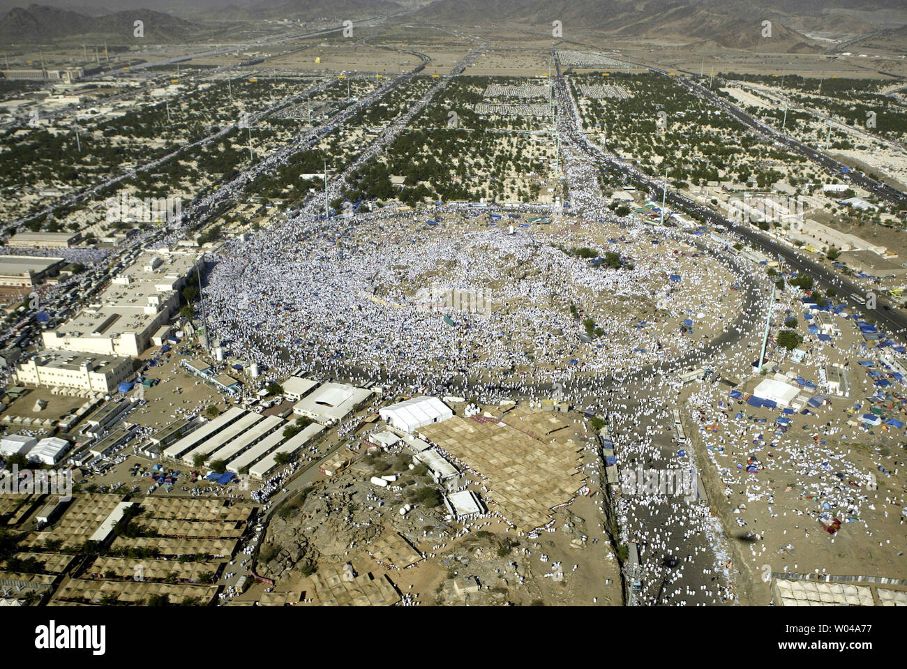 An aerial view shows hundreds of thousands of pilgrims praying at the ...