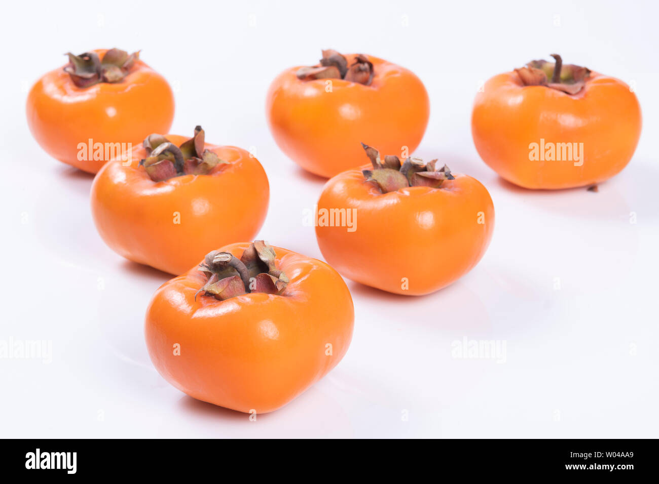 Red persimmon hi-res stock photography and images - Alamy