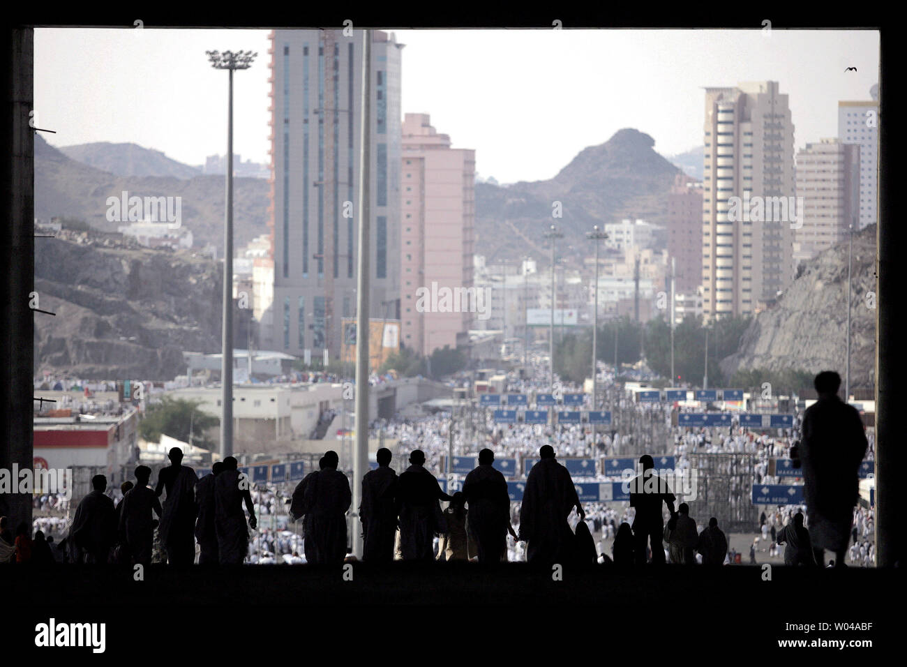 Muslim pilgrims leave after stoning one of three pillars in a ritual ...