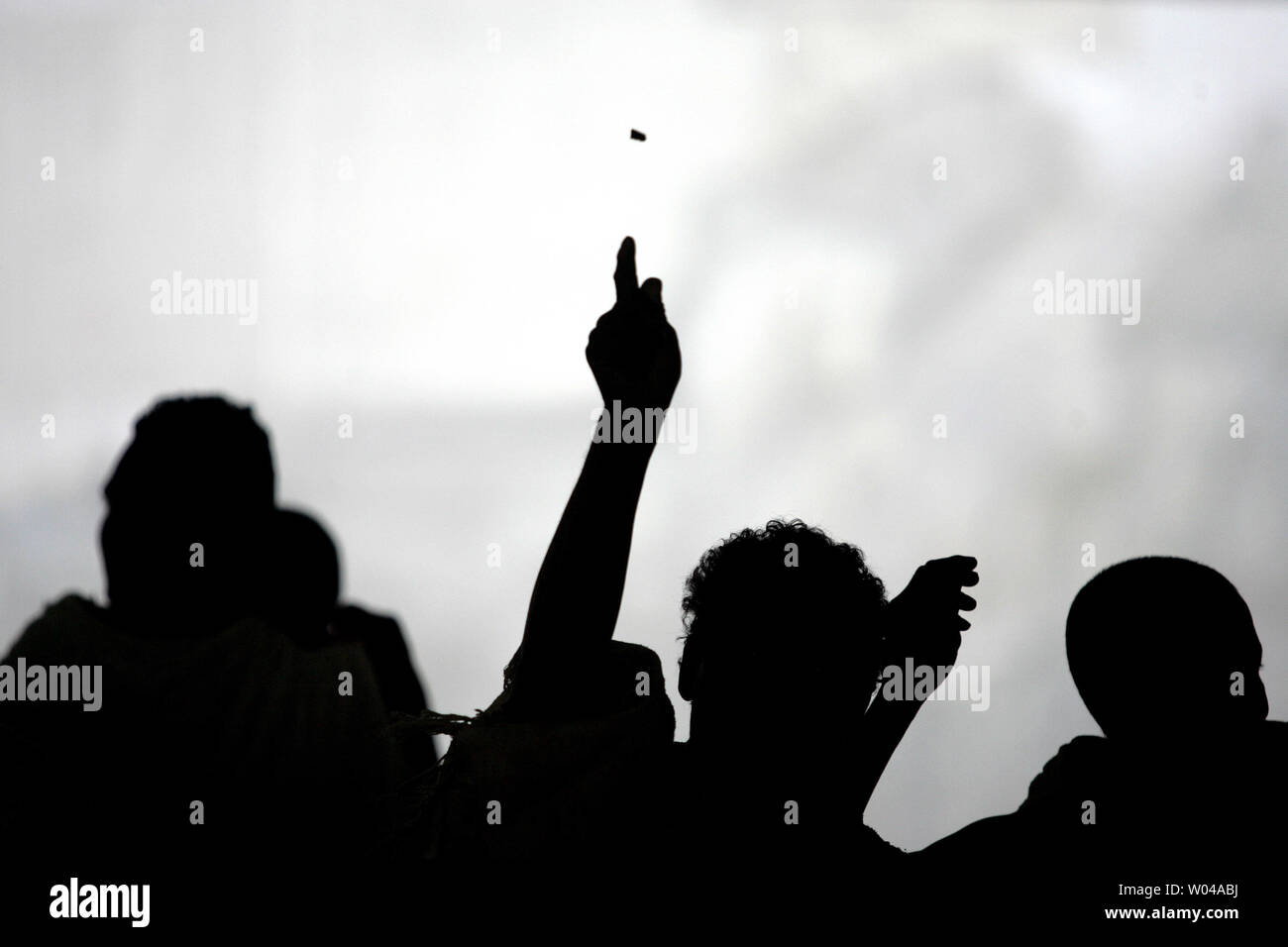Muslim pilgrims stone one of three pillars in a ritual called 'Jamarat ...