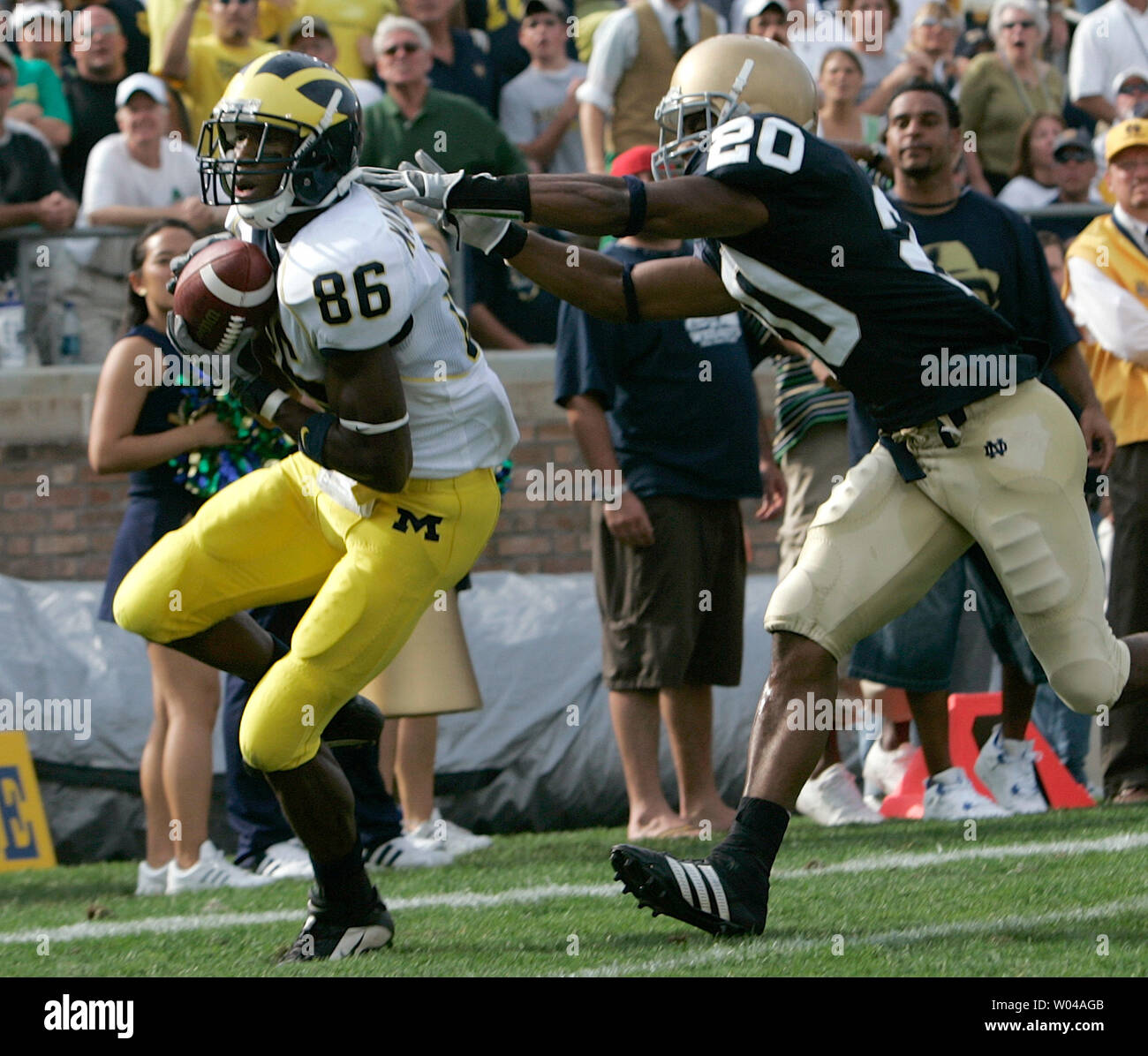 Michigan receiver Mario Manningham (86) hauls in a 20-yard touchdown ...