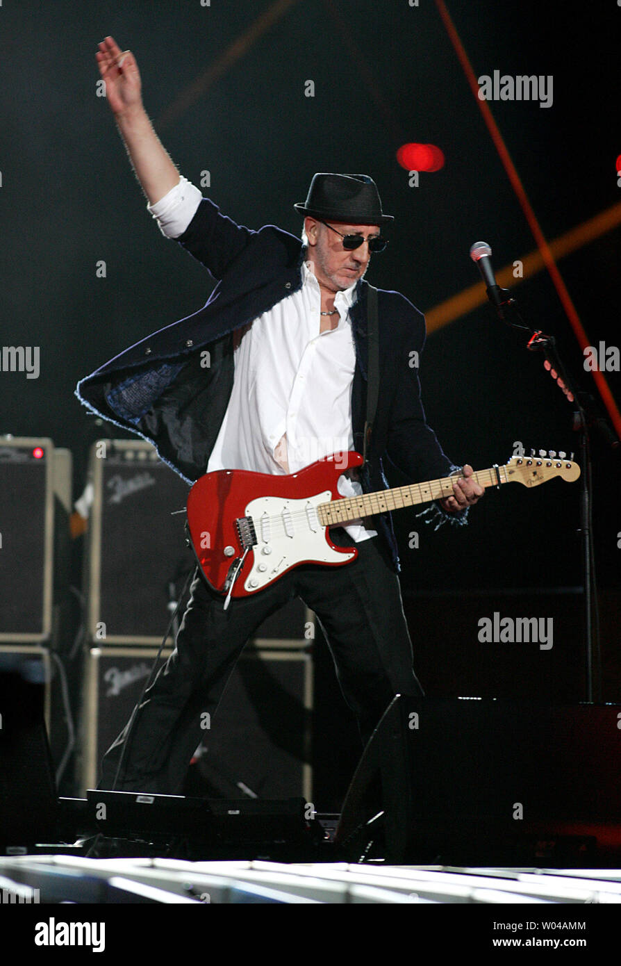 Pete Townshend and the Who perform during halftime at Super Bowl XLIV ...