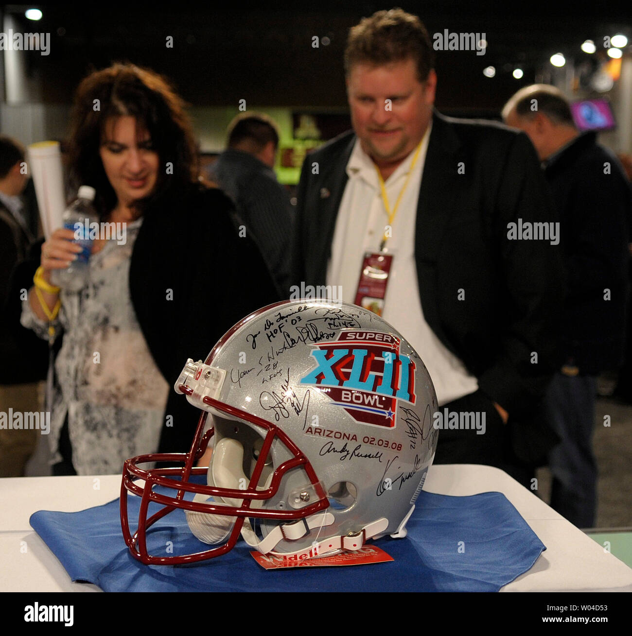 A football helmet signed by the 2008 Taste of the NFL football players ...