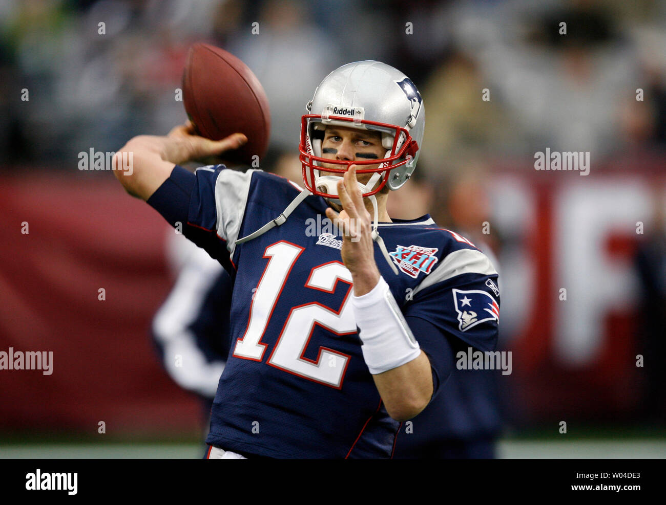 New England Patriots quarterback Tom Brady warms-up prior to the Super Bowl XLII in Glendale ...