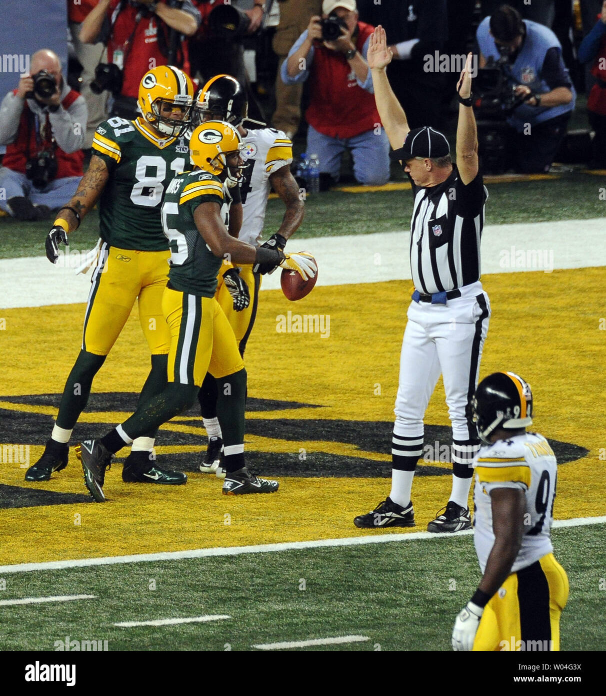 Green Bay Packers wide receiver Greg Jennings celebrates a touchdown ...