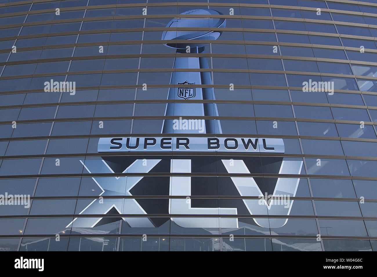 The Super Bowl logo adorns several stories on the side of the Cowboys ...