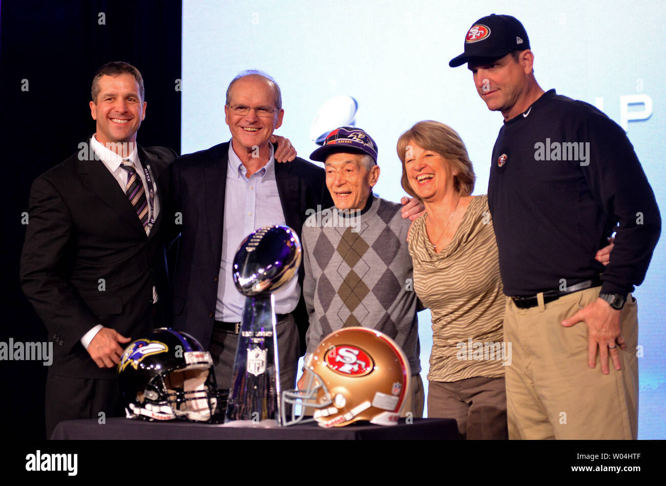 Baltimore Ravens head coach John Harbaugh (L) and his brother head ...