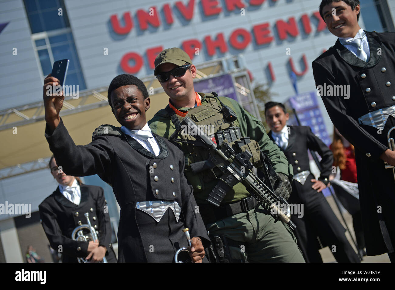 Band member Samuel Jordan takes a selfie with Glendale Police ...