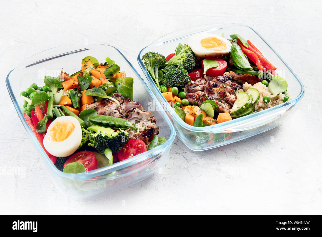 Healthy lunch box with chicken, quinoa and vegetables. Balanced diet ...