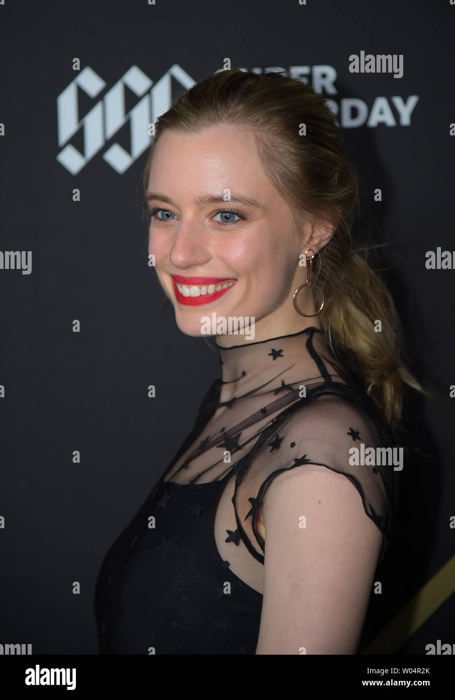 Anja Savcic arrives at the DIRECTV Super Saturday Night red carpet at ...