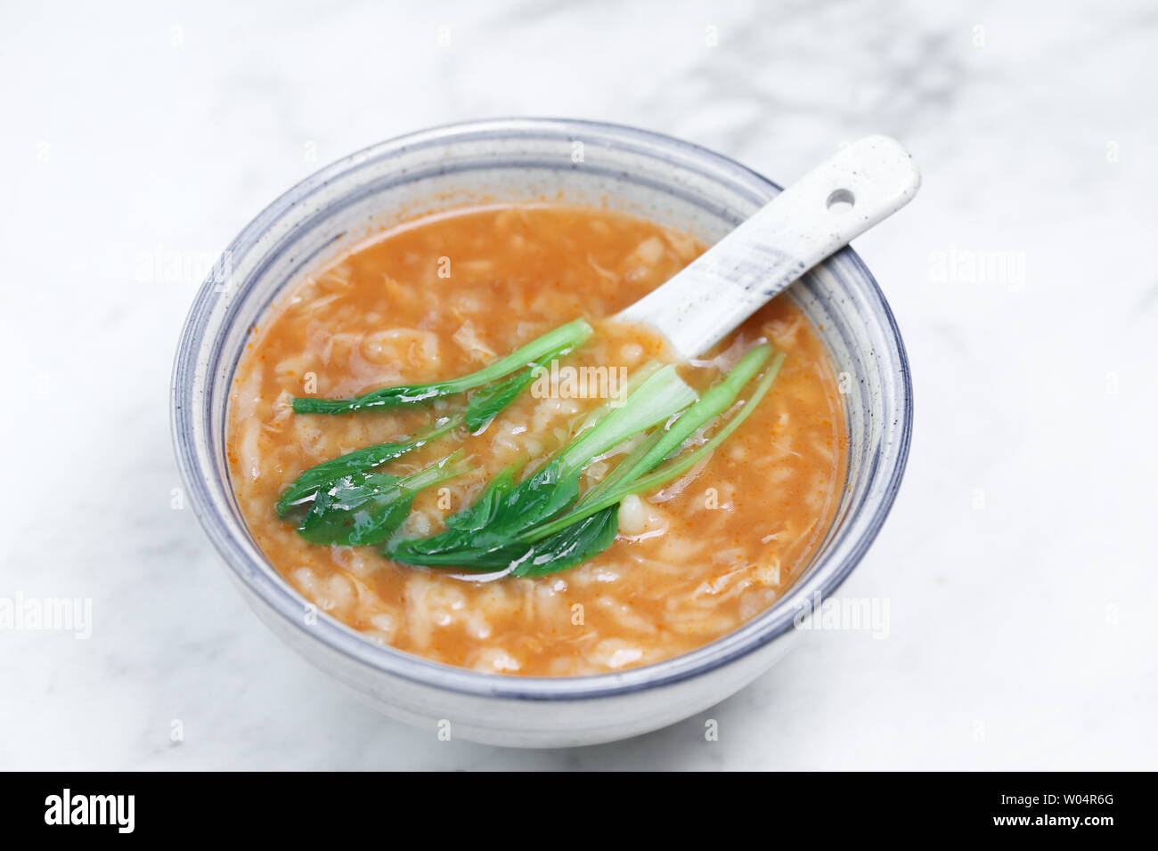 Traditional Chinese snack tomato lumpy soup Stock Photo - Alamy