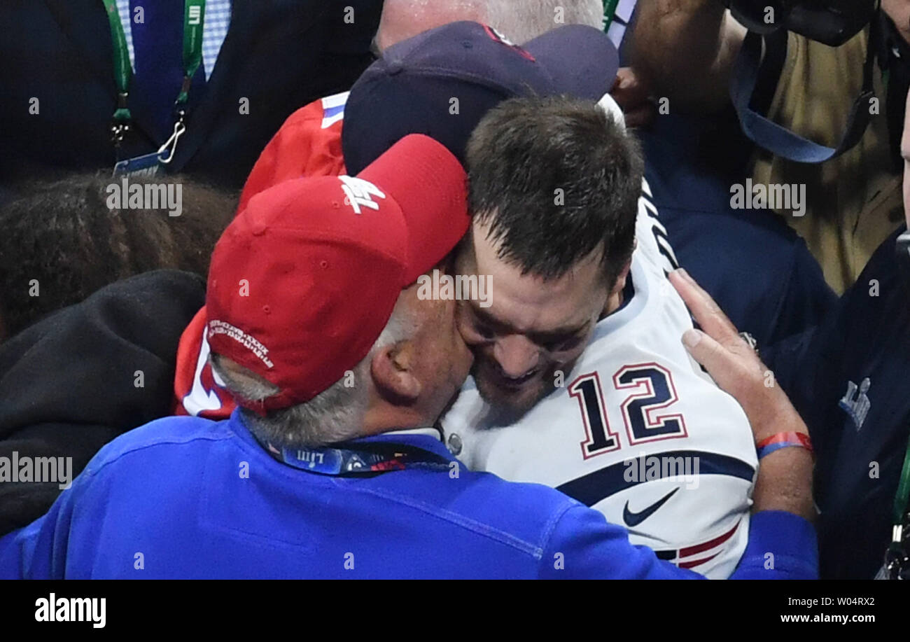 New England Patriots quarterback Tom Brady (C) greets family members ...