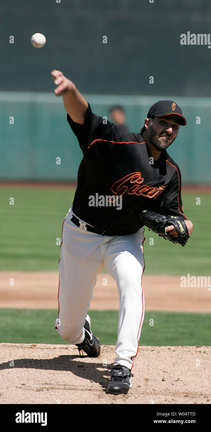 San Francisco Giant starting pitcher Matt Morris warms up for the first ...
