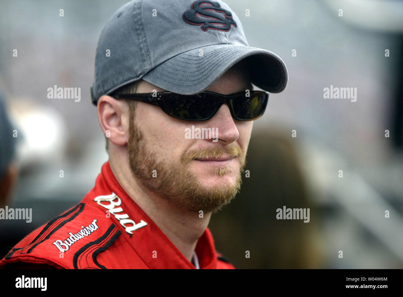 Dale Earnhardt Jr. stands on pit road before the start of the Dodge ...