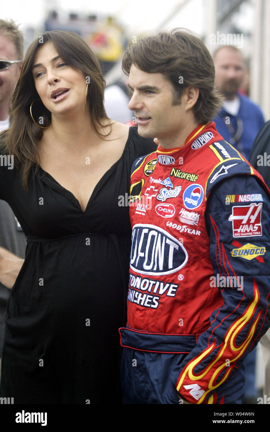 Race car driver Jeff Gordon, right, and his pregnant wife Ingrid ...