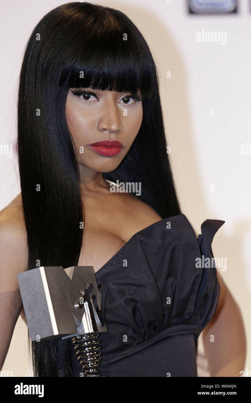 Nicki Minaj holds her trophy for Best Hip Hop backstage at the MTV ...