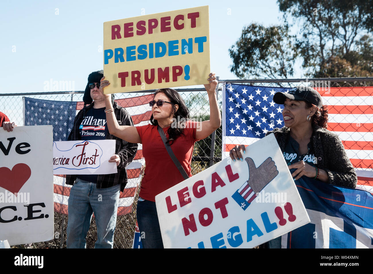Demonstrators at an "America First" rally at the San Ysidro Port of ...
