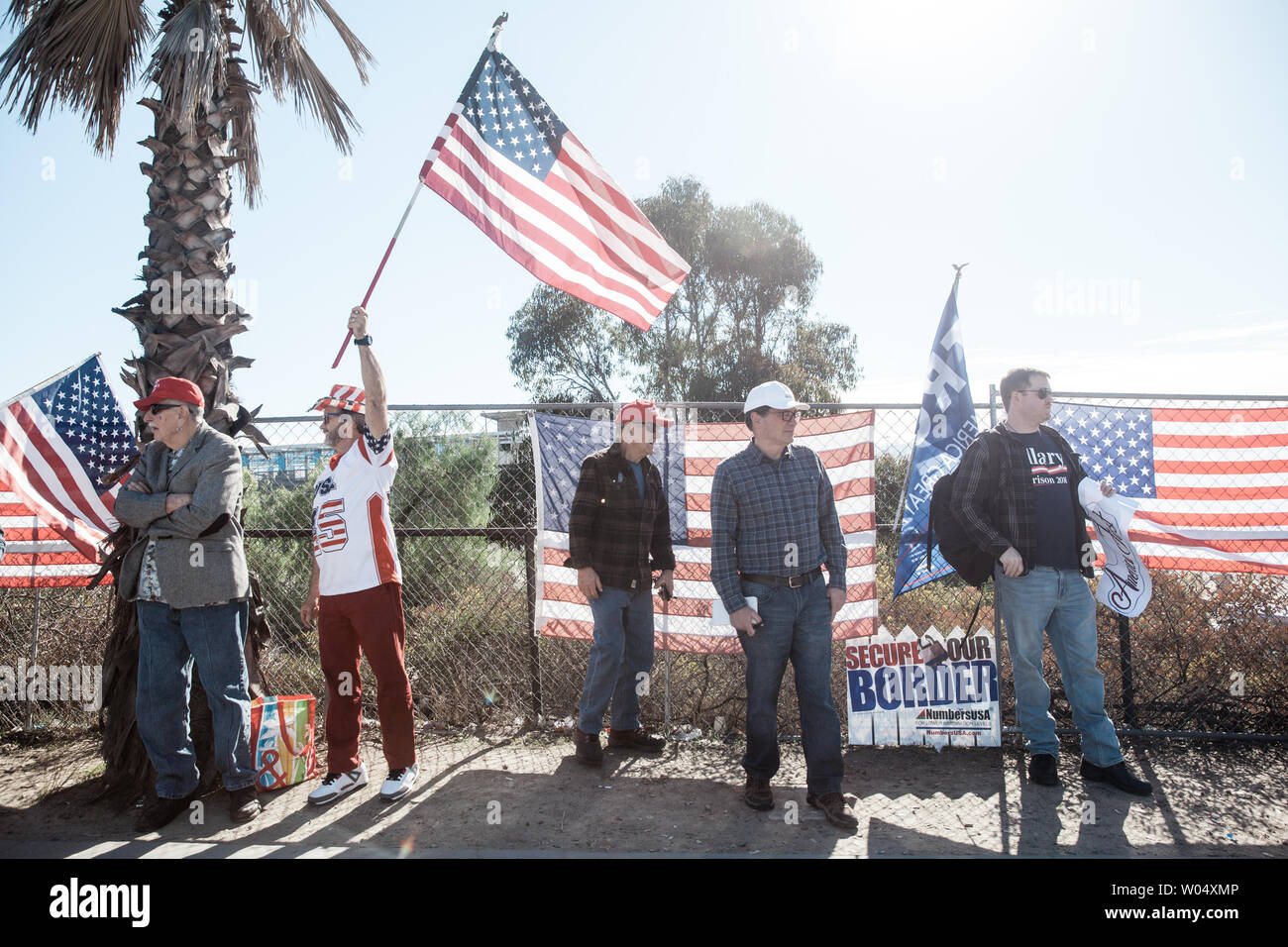 Demonstrators attend an "America First" rally at the San Ysidro Port of ...