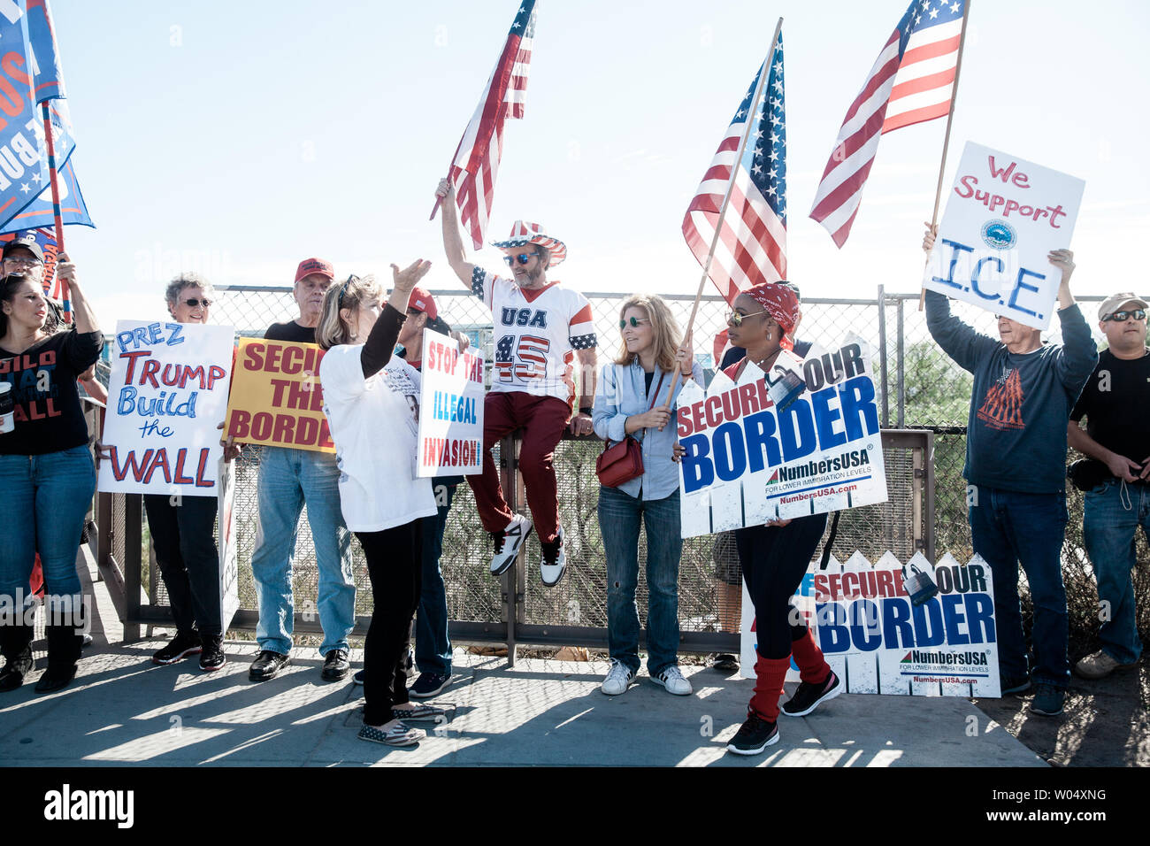 Demonstrators attend an "America First" rally at the San Ysidro Port of ...