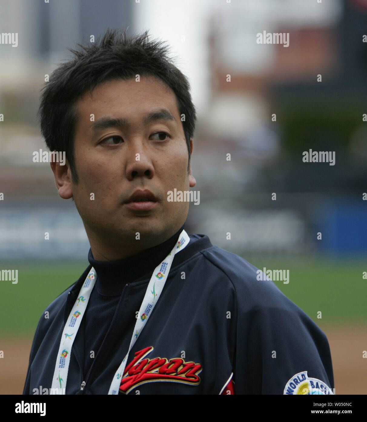 duplicate/rlw Pitcher Naoyuki Shimizu of team Japan, waits for the ...