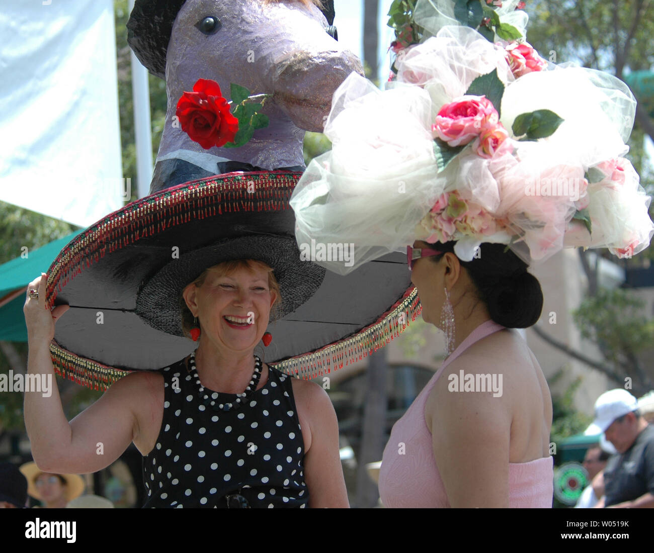 Lisa Rene Anderson (L) talks to Ana Flora- Esondio during the best hat ...