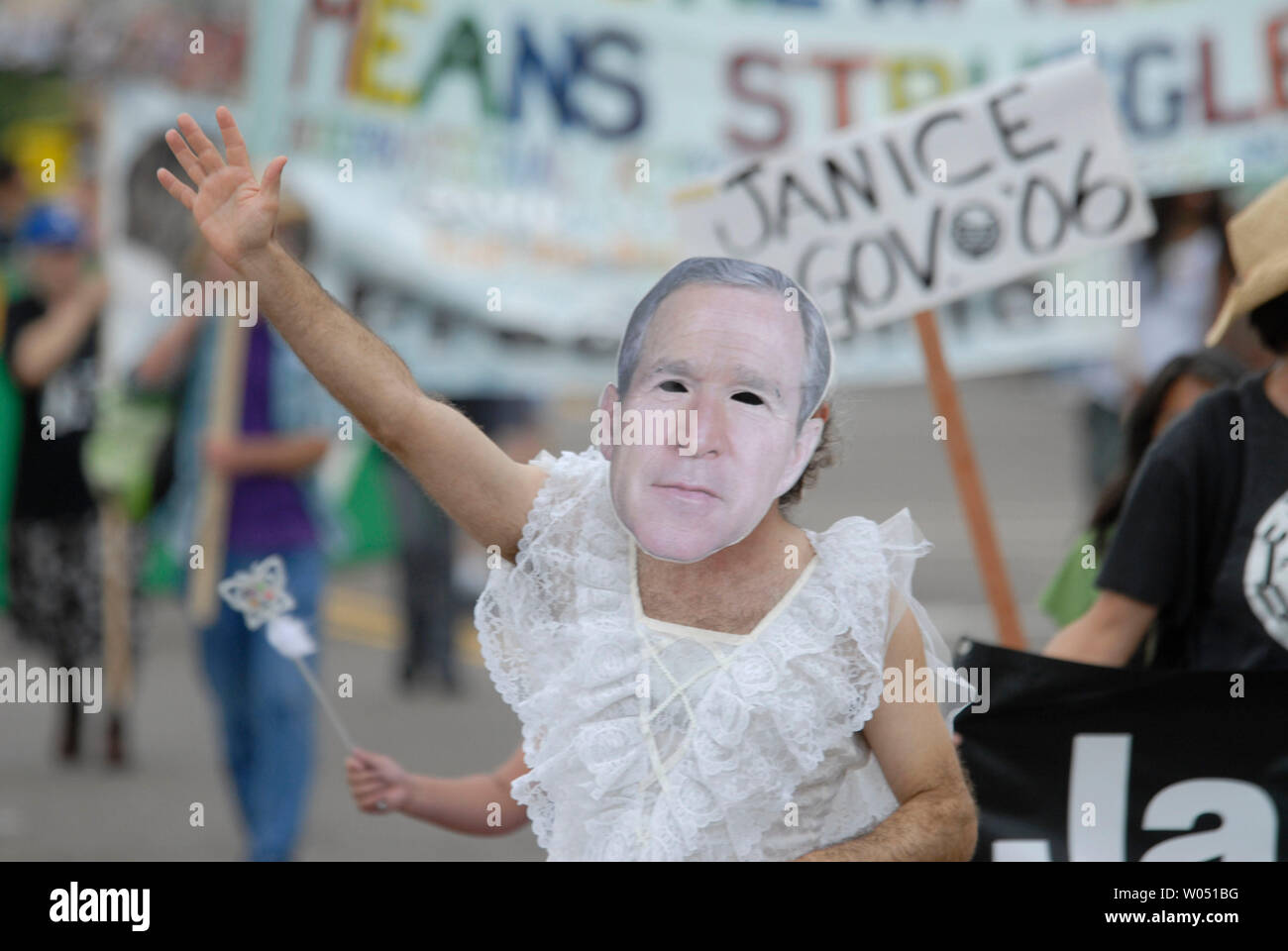 Wearing a george bush mask hi-res stock photography and images - Alamy