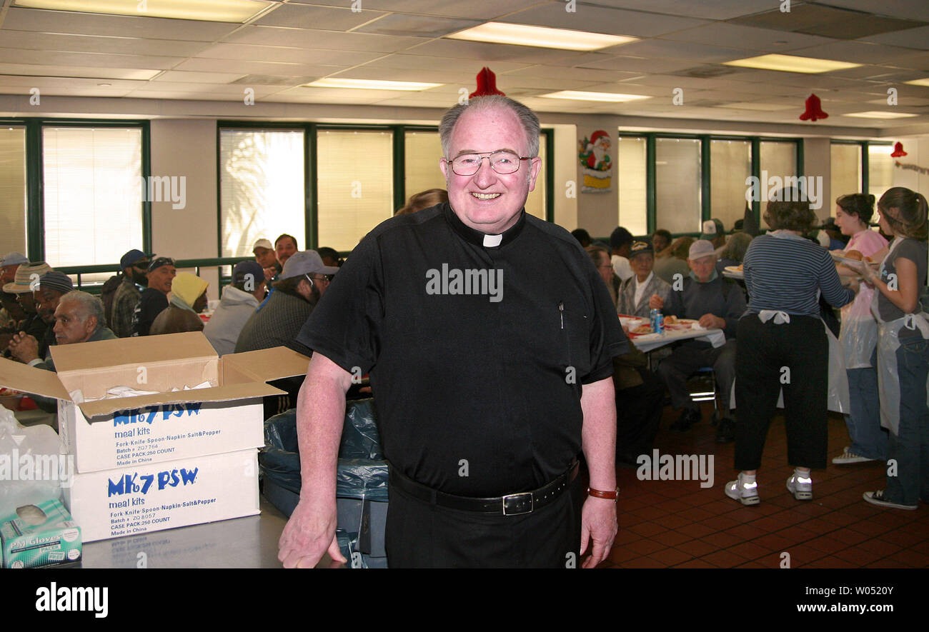 Father Joe Carroll feeds the homeless and needy during his annual ...