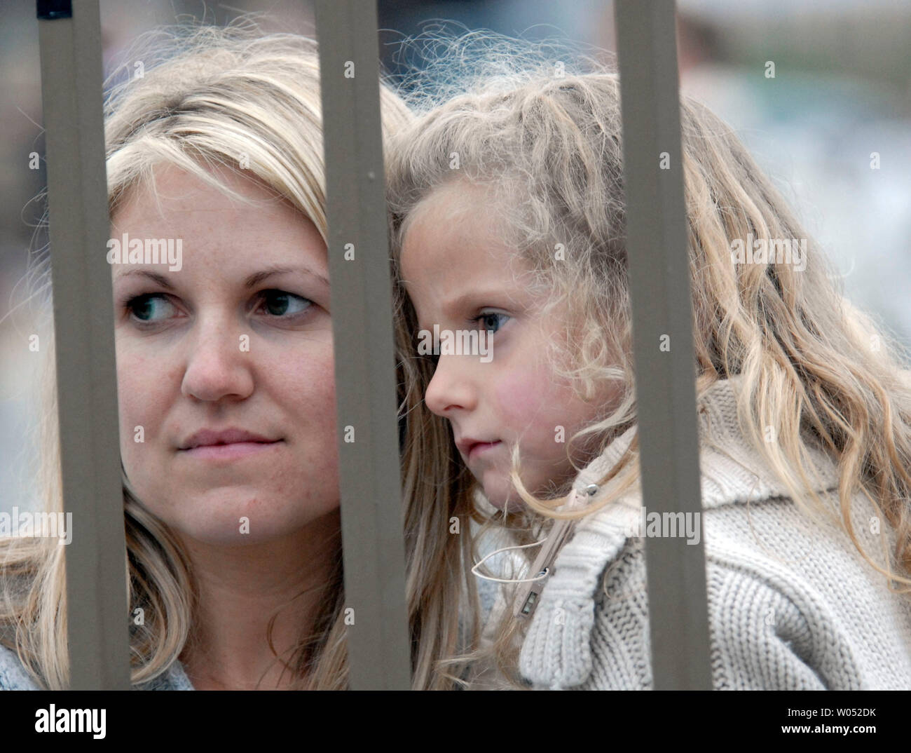 Marla Jelsema (L) along with her five year old daughter, Taylor, watch ...