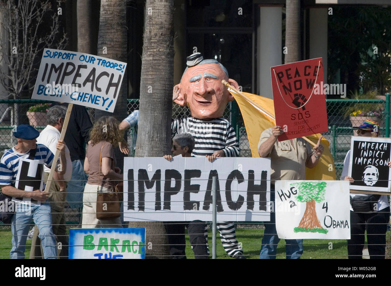 Protesters in favor of impeaching U.S. President George W. Bush wave ...