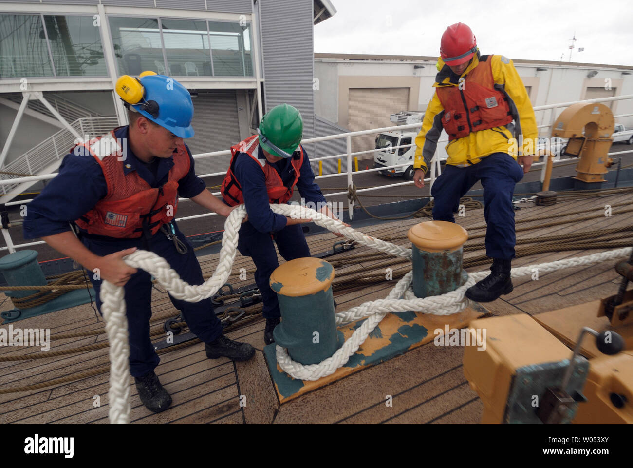 Crewmembers of the United States Coast Guard's Tall Ship Eagle man the ...