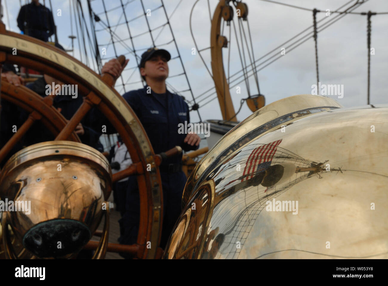 Crewmembers of the United States Coast Guard's Tall Ship Eagle man the ...