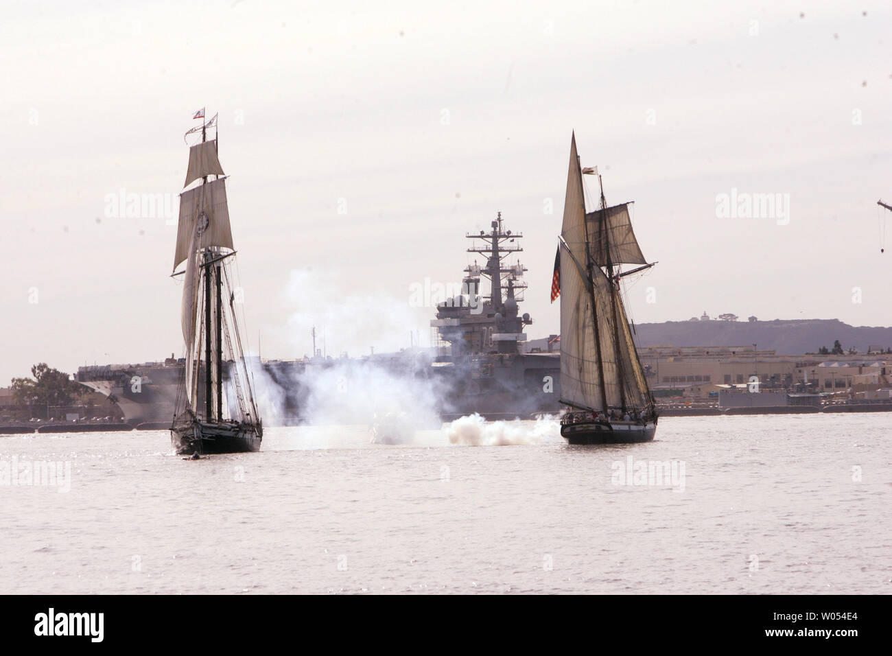 Americas Privateer Lynx (L) and the USS Californian fire their cannons ...