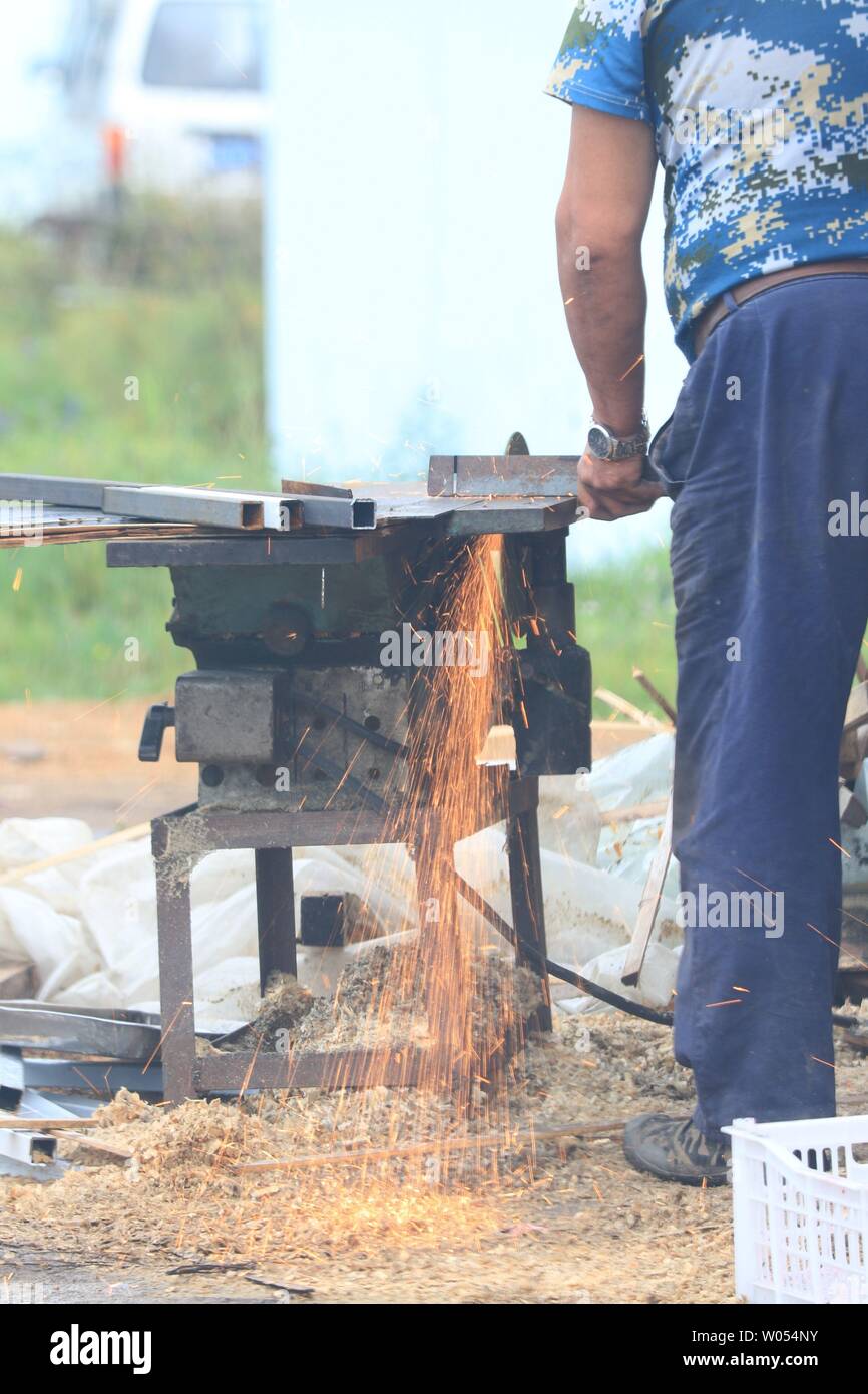 Man male with a group of adults with outdoor industry hi-res stock ...