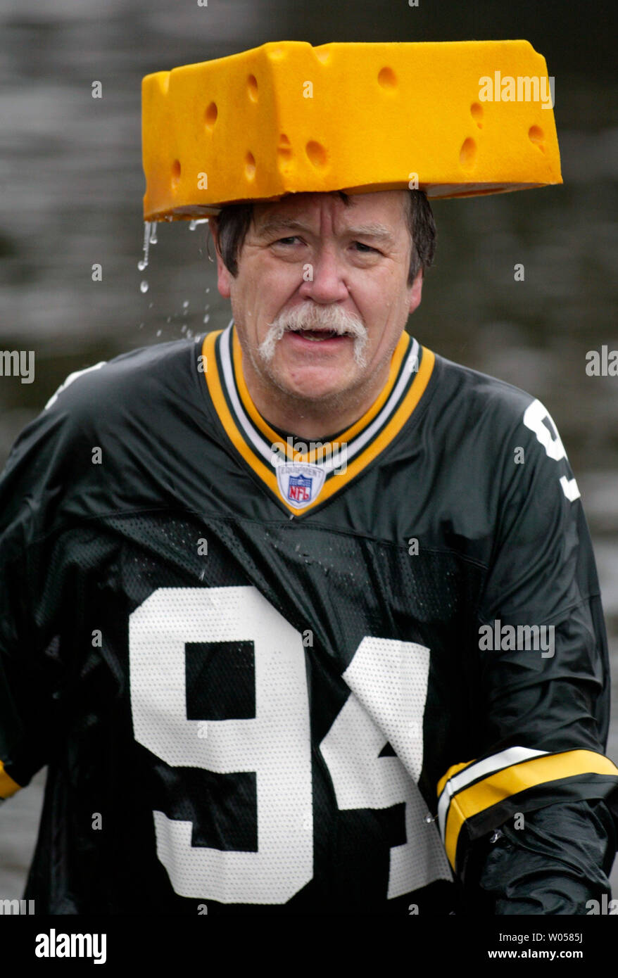 Green Bay Packer fan Mike Doidge, of Rosedale, Washington, gets out of ...
