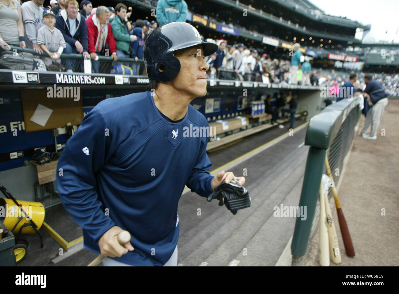New York Yankees' Hideki Matsui of Japan runs out of the team dugout ...