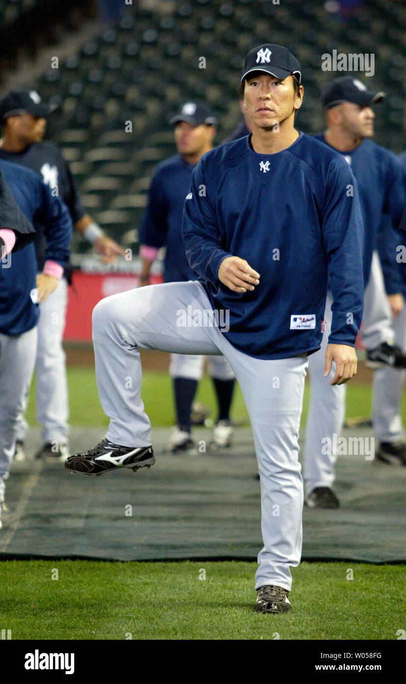 New York Yankees' Hideki Matsui of Japan stretches before their game ...